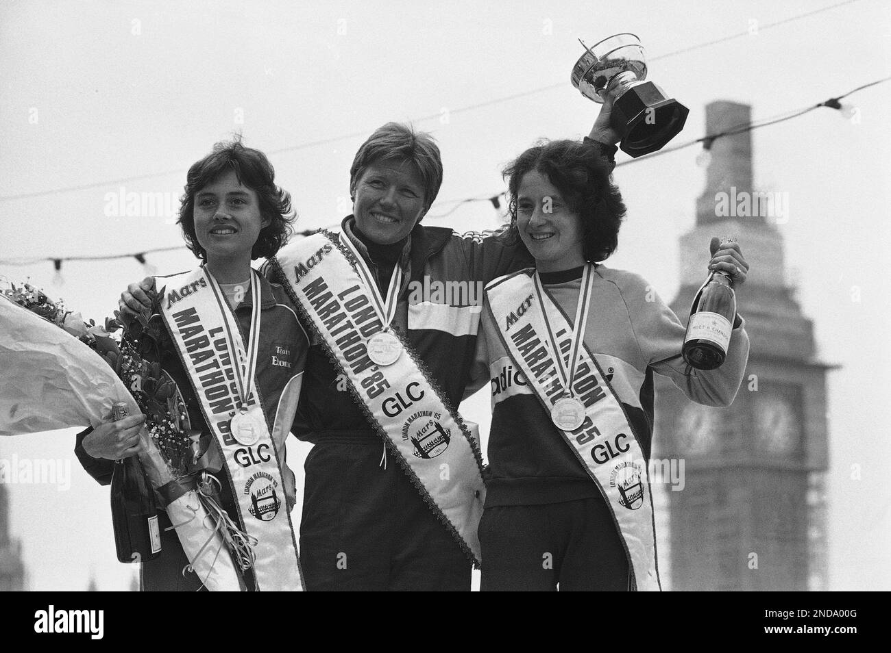 Norway’s Ingrid Kristiansen, is flanked by second placer Sarah Rowell ...