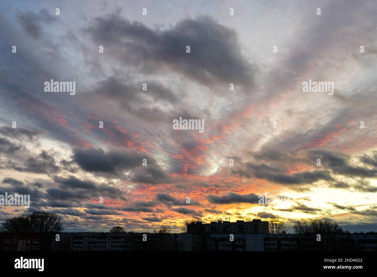 Scenic dramatic sunset skyscape with beautiful colorful clouds in an ...