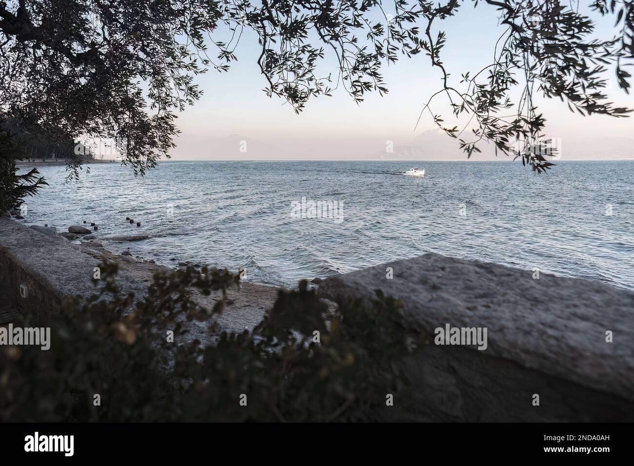 A breathtaking view of the picturesque shoreline of Lake Garda ...