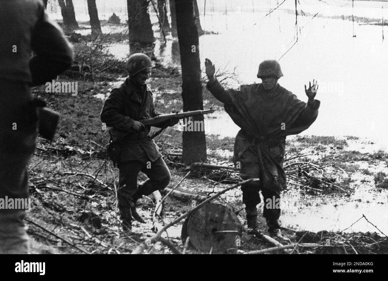 Combat troops moved towards German position sixty yards from a bridge ...