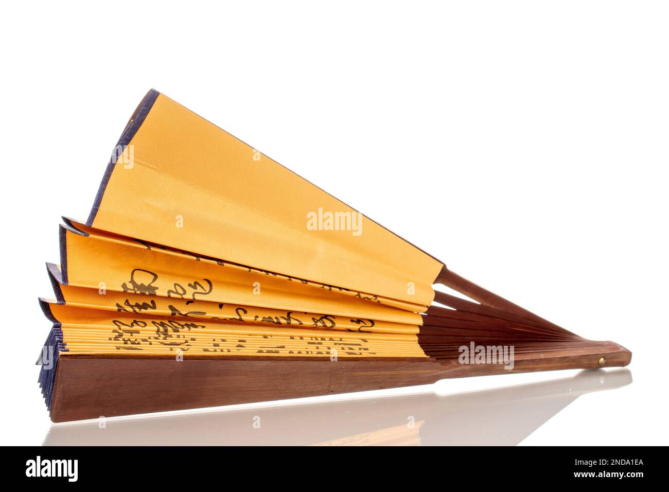One folding bamboo fan, macro, isolated on white background Stock Photo ...