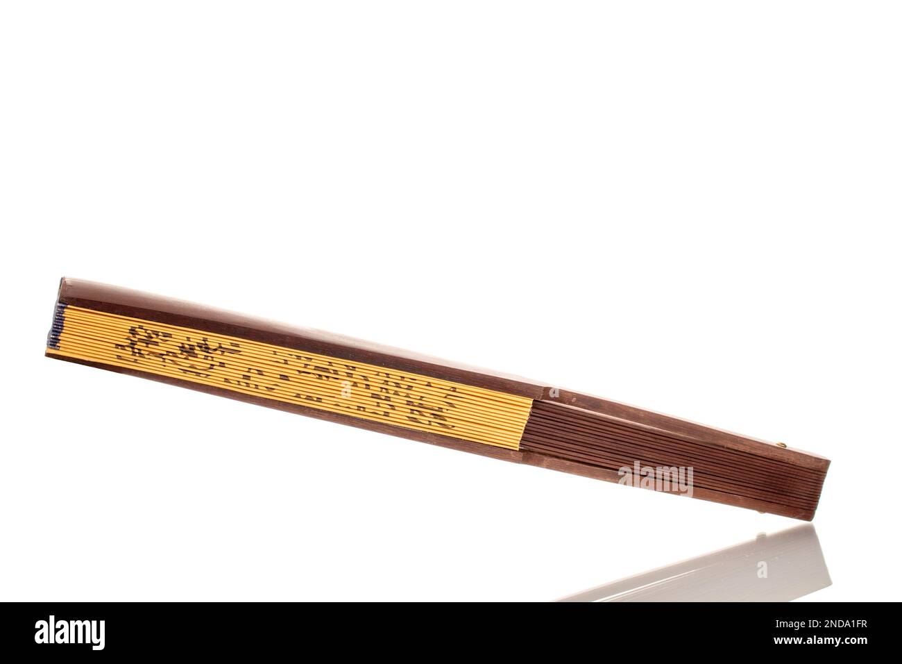 One folding bamboo fan, macro, isolated on white background Stock Photo ...