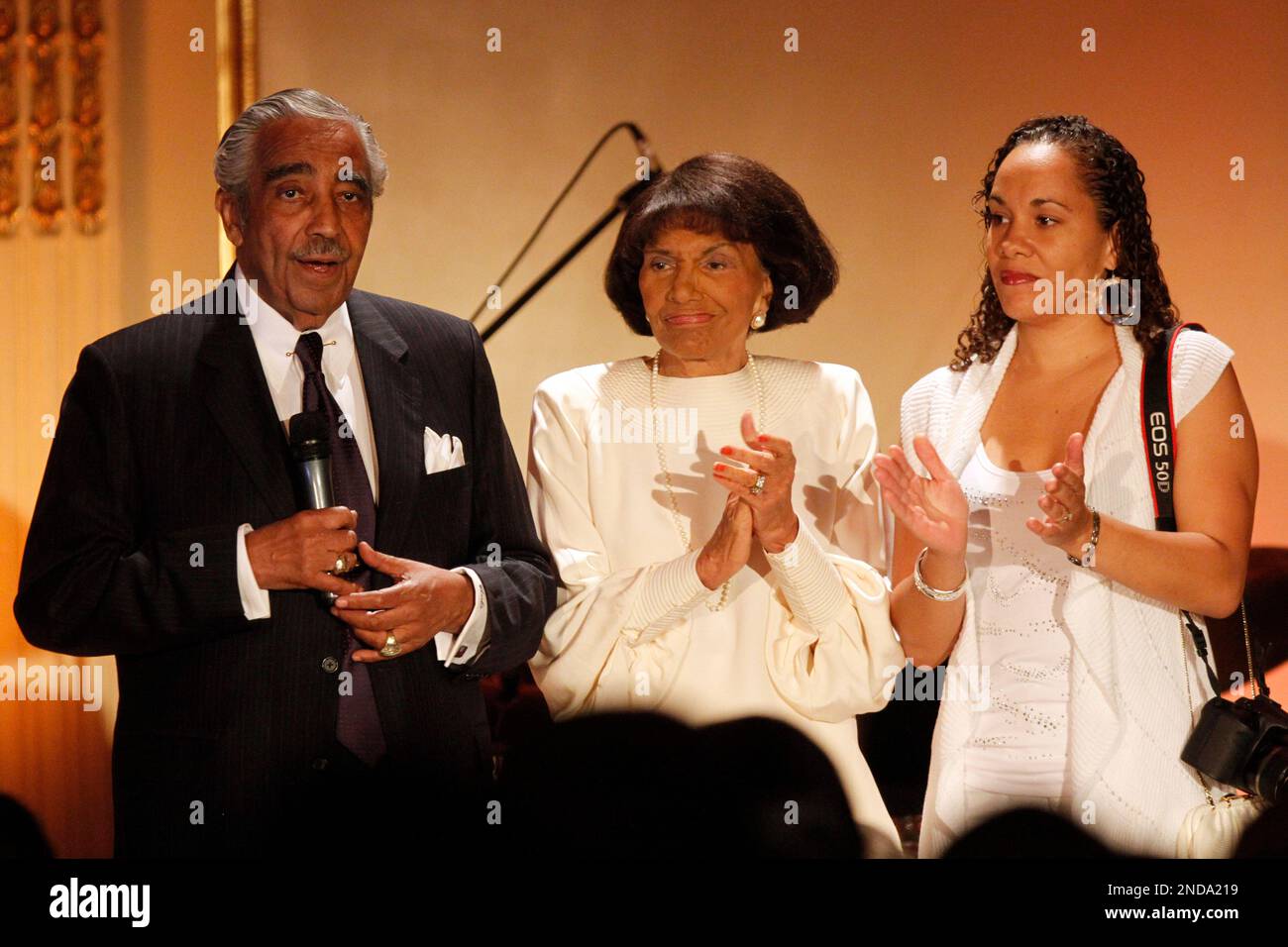 Rep. Charles Rangel, center D-N.Y., left, is joined onstage by his wife ...