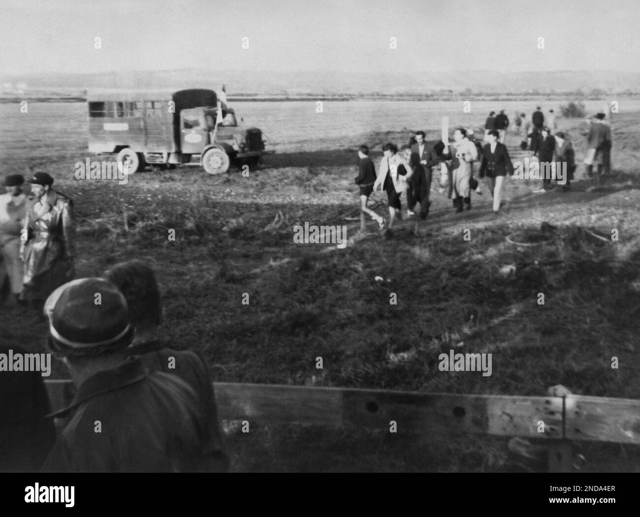 A group of Hungarian refugees cross the Austro-Hungarian border at ...