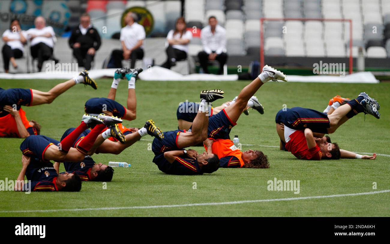Spain's players stretch during a soccer training session at Azteca ...
