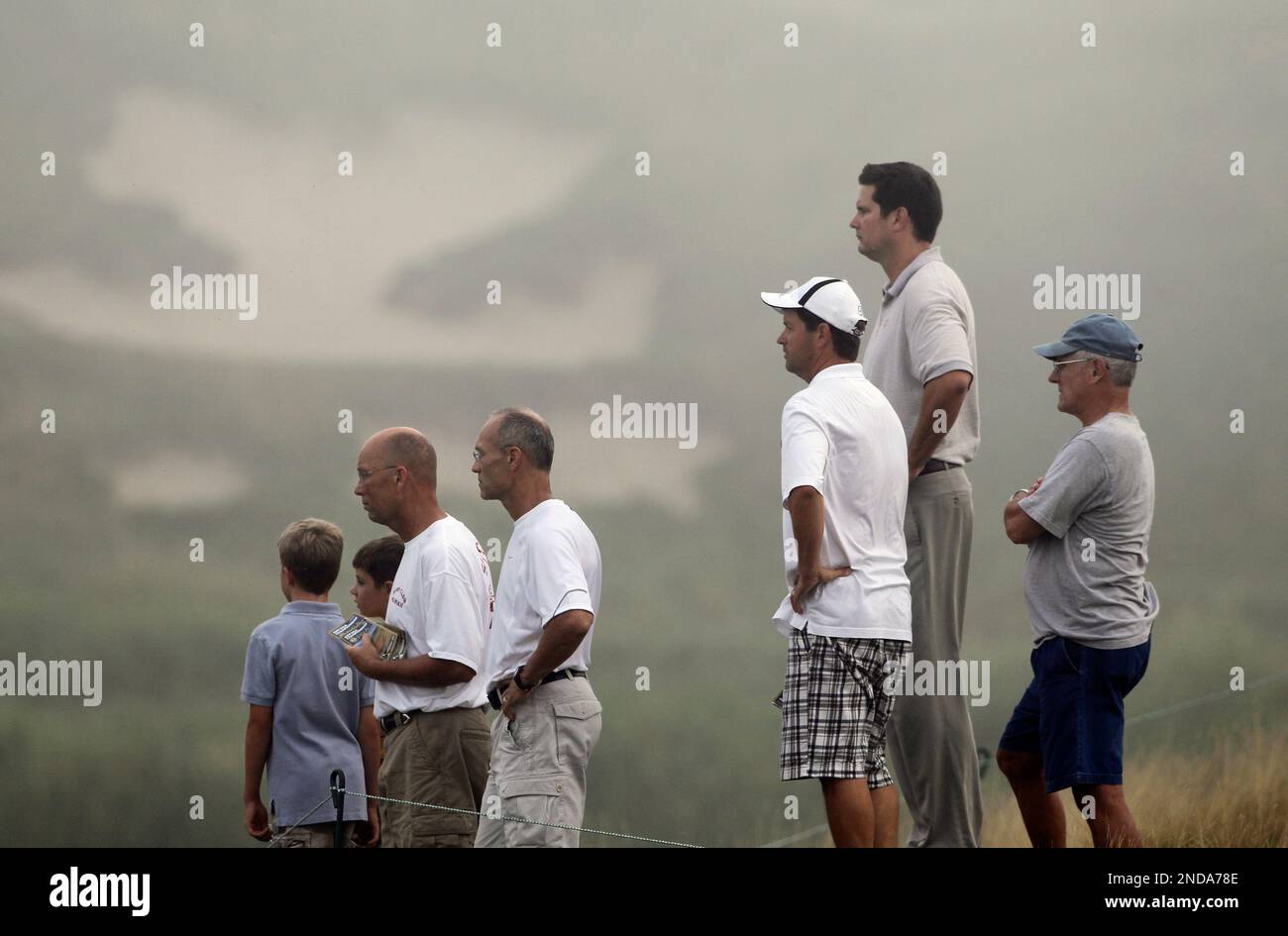 Fans watch golfers during a practice round for the PGA Championship ...