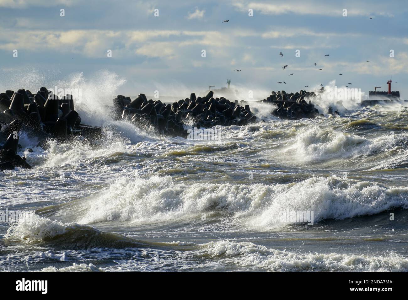 Coastal storm in the Baltic Sea, big waves crash against the concrete ...