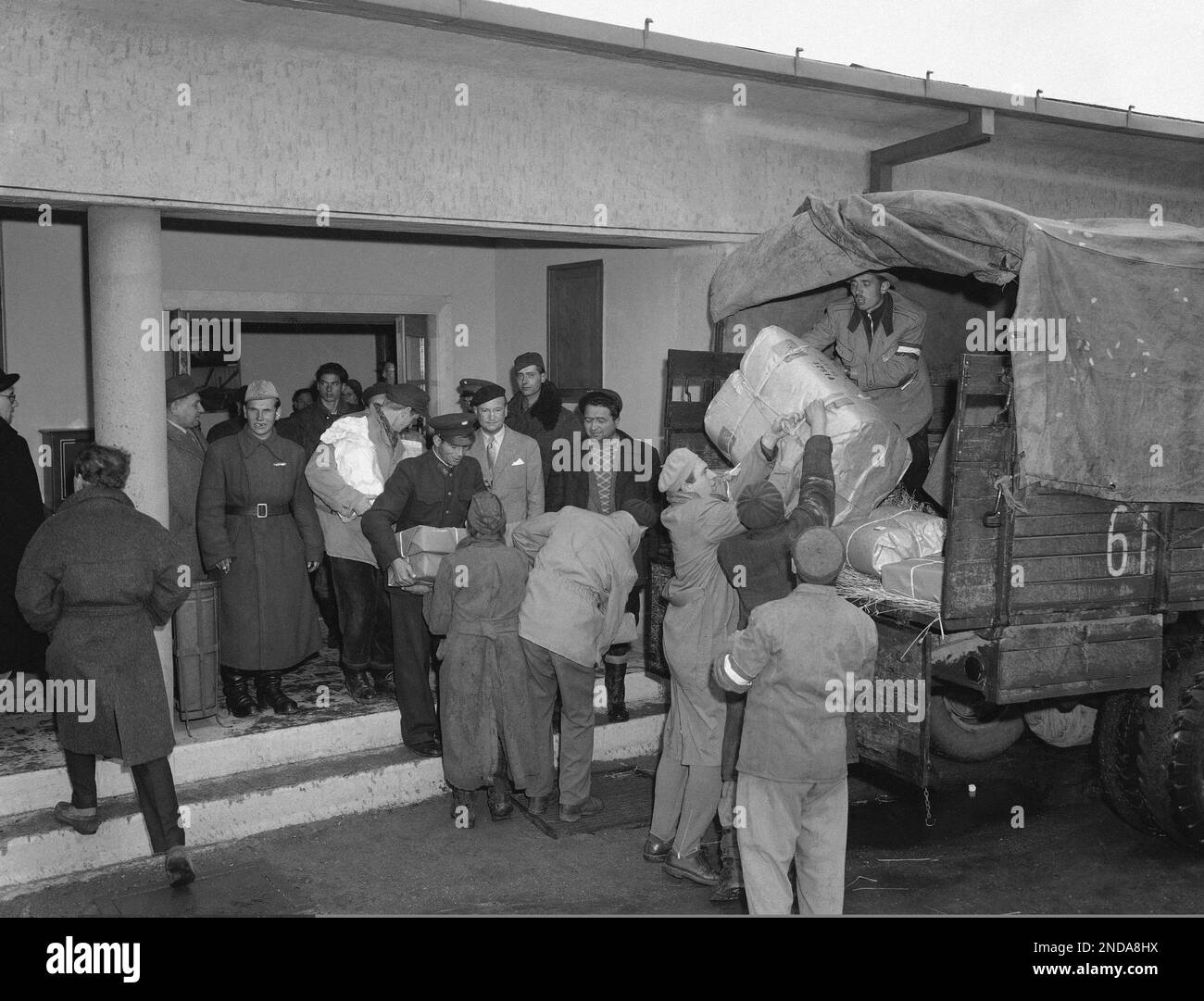 Medical supplies for the Hungarian rebel forces are loaded aboard ...