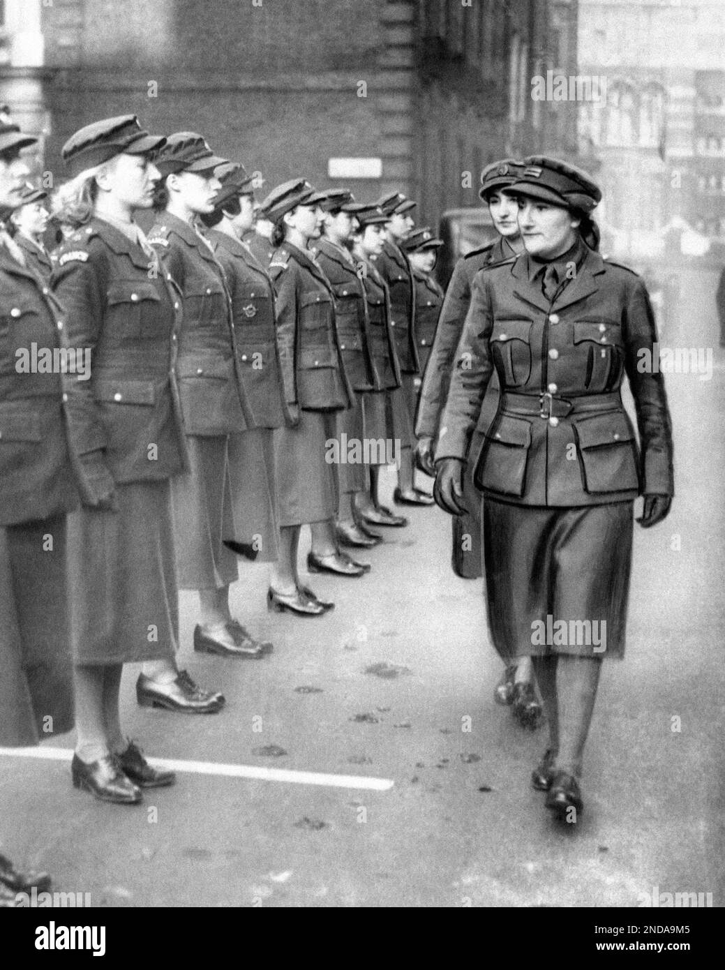 Madame Mathieu, the famous French Lawn Tennis player inspecting members ...