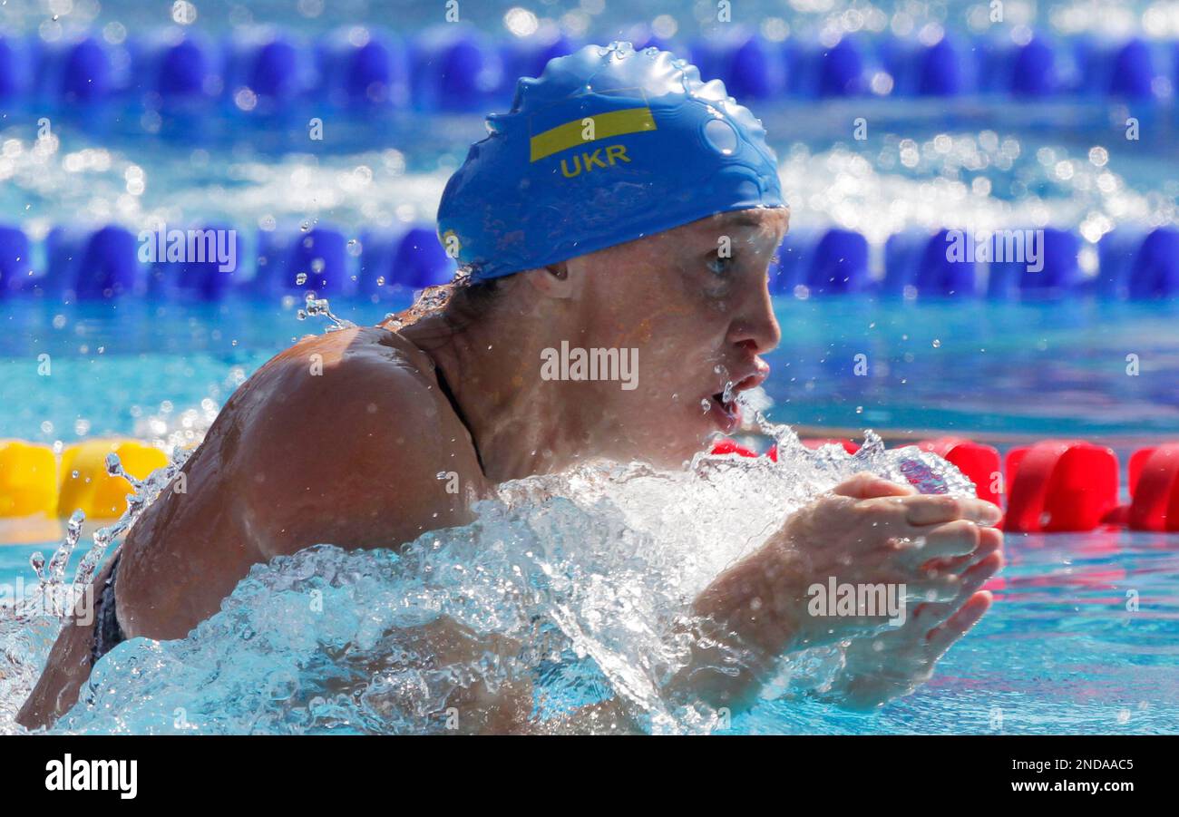 Ukraine's Svitlana Bondarenko swims a Women's 100m breaststroke heat at ...