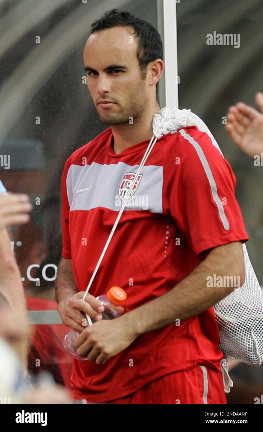 US Soccer player Landon Donovan walks off the field after practice at ...