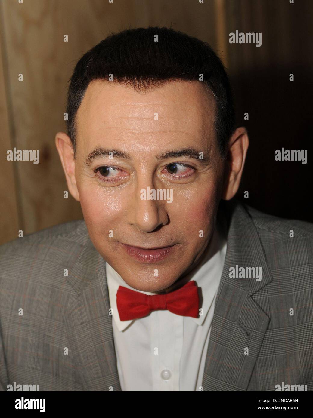 Comedian Paul Ruebens, aka Pee Wee Herman, talks with a reporter during ...