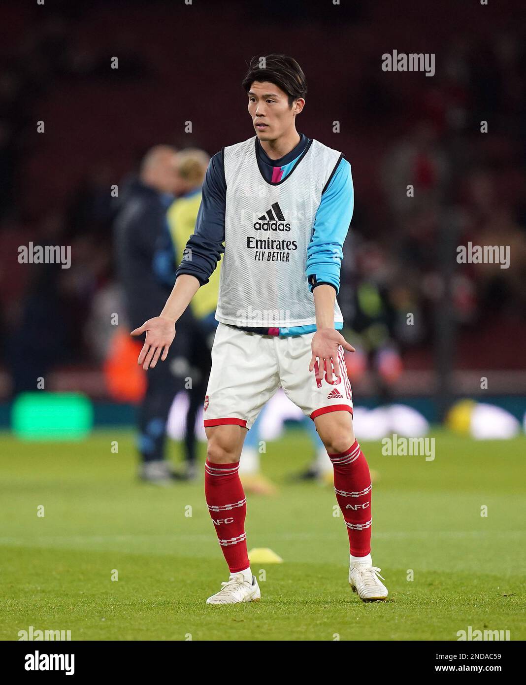 Arsenal’s Takehiro Tomiyasu warms up before the Premier League match at ...