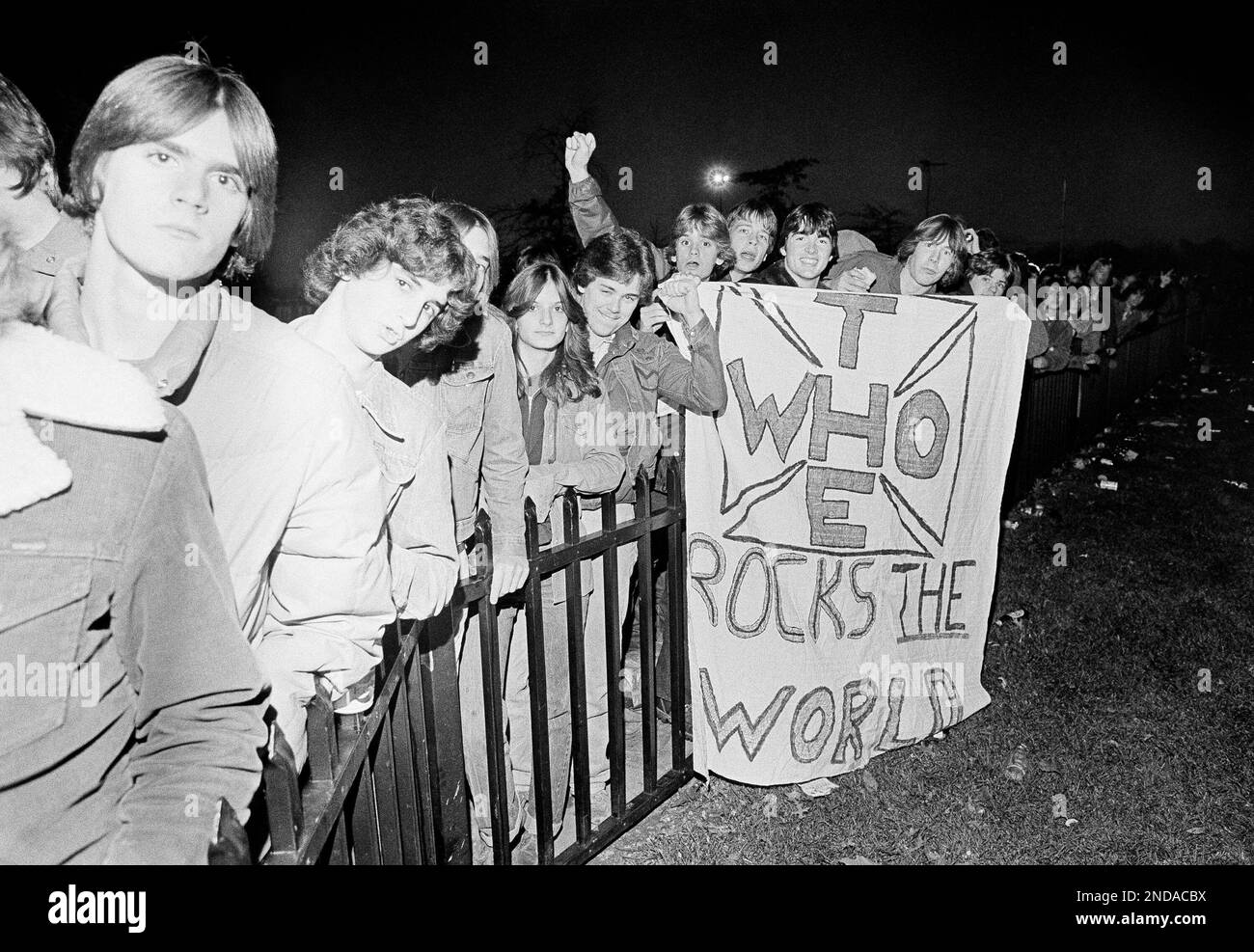 Rock fans attending the Who concert in Philadelphia hold up a banner ...