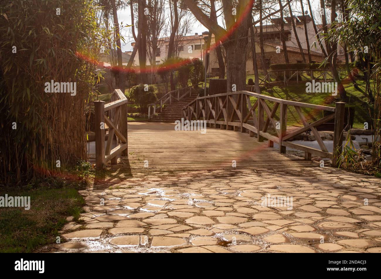 Construction of wooden bridge and protection railing in artificial lake ...