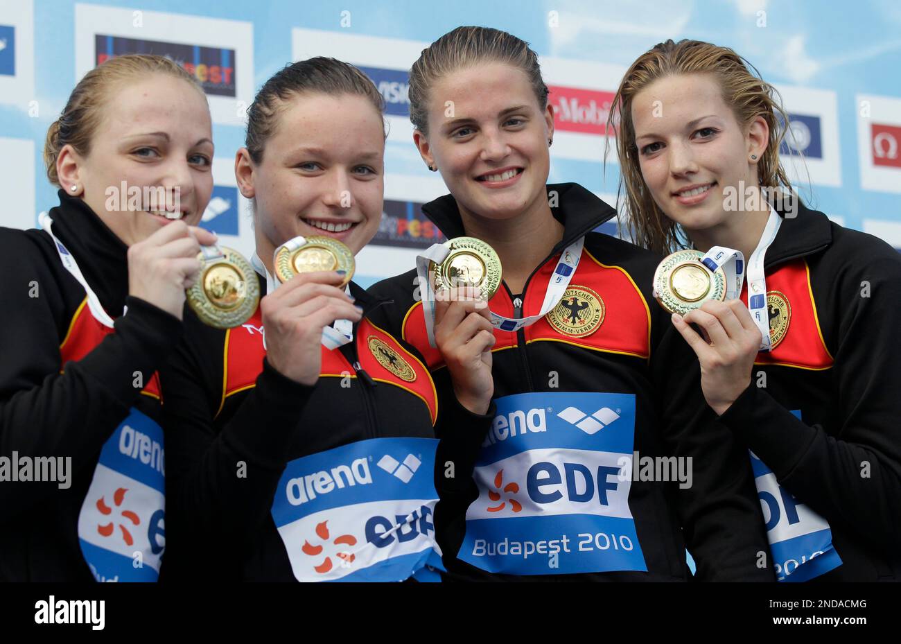 Germany's gold medal winning team show their medals after the ceremony ...