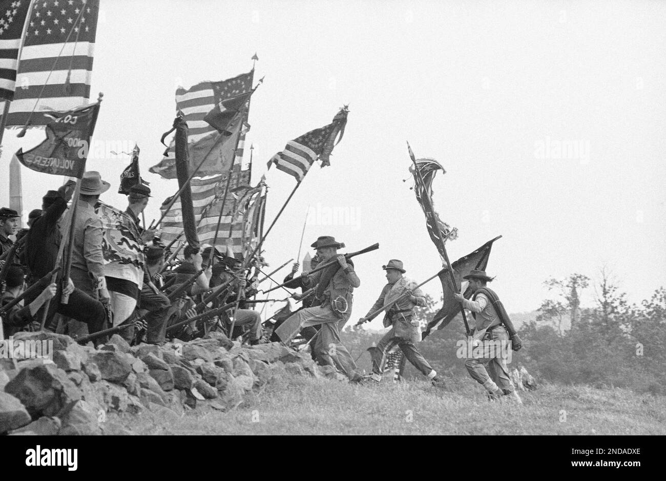 Confederate troops storm the Union lines at the high water mark on the ...