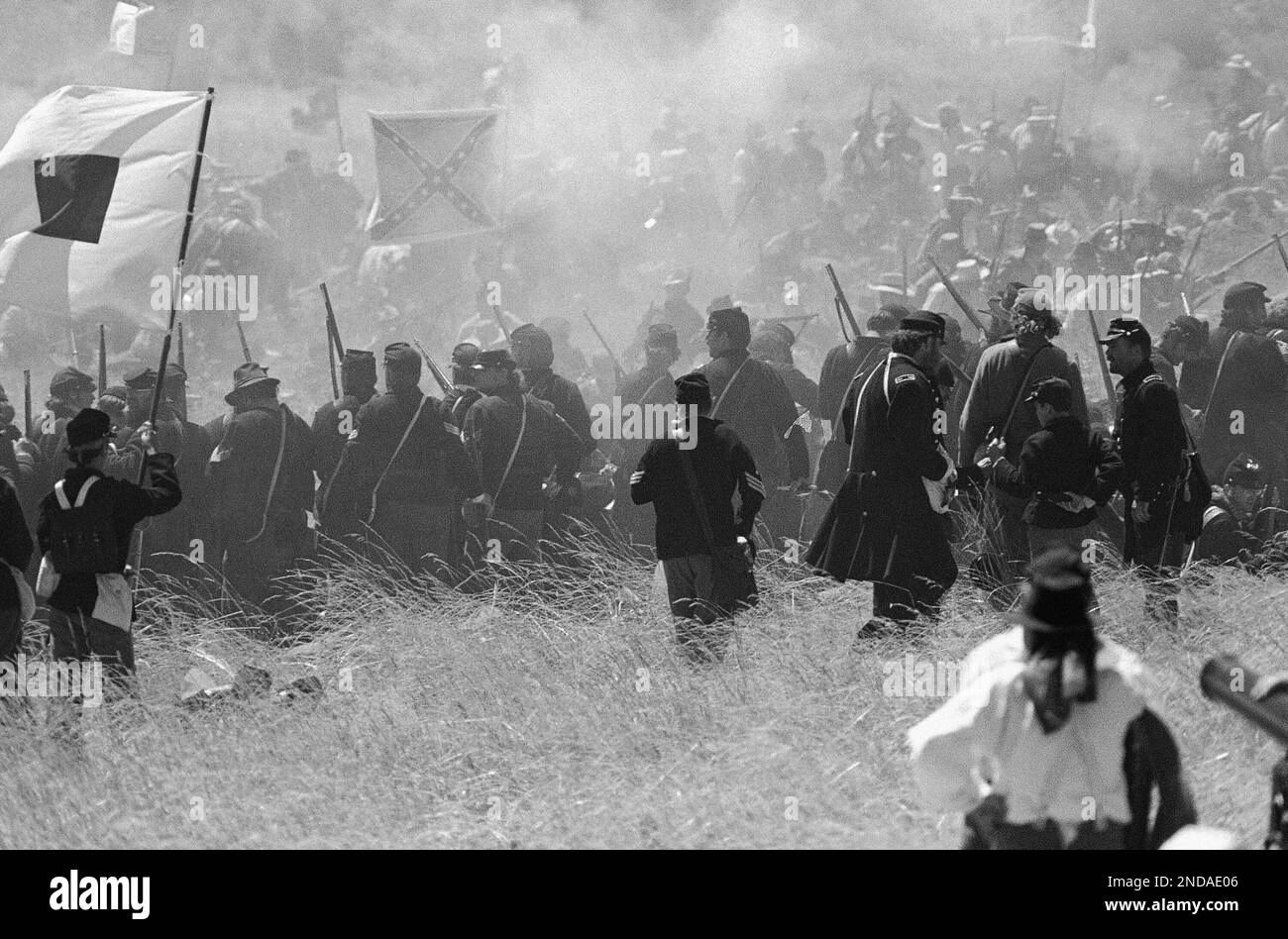 Smoke drifts over the field as Confederates, rear, charge the Union ...