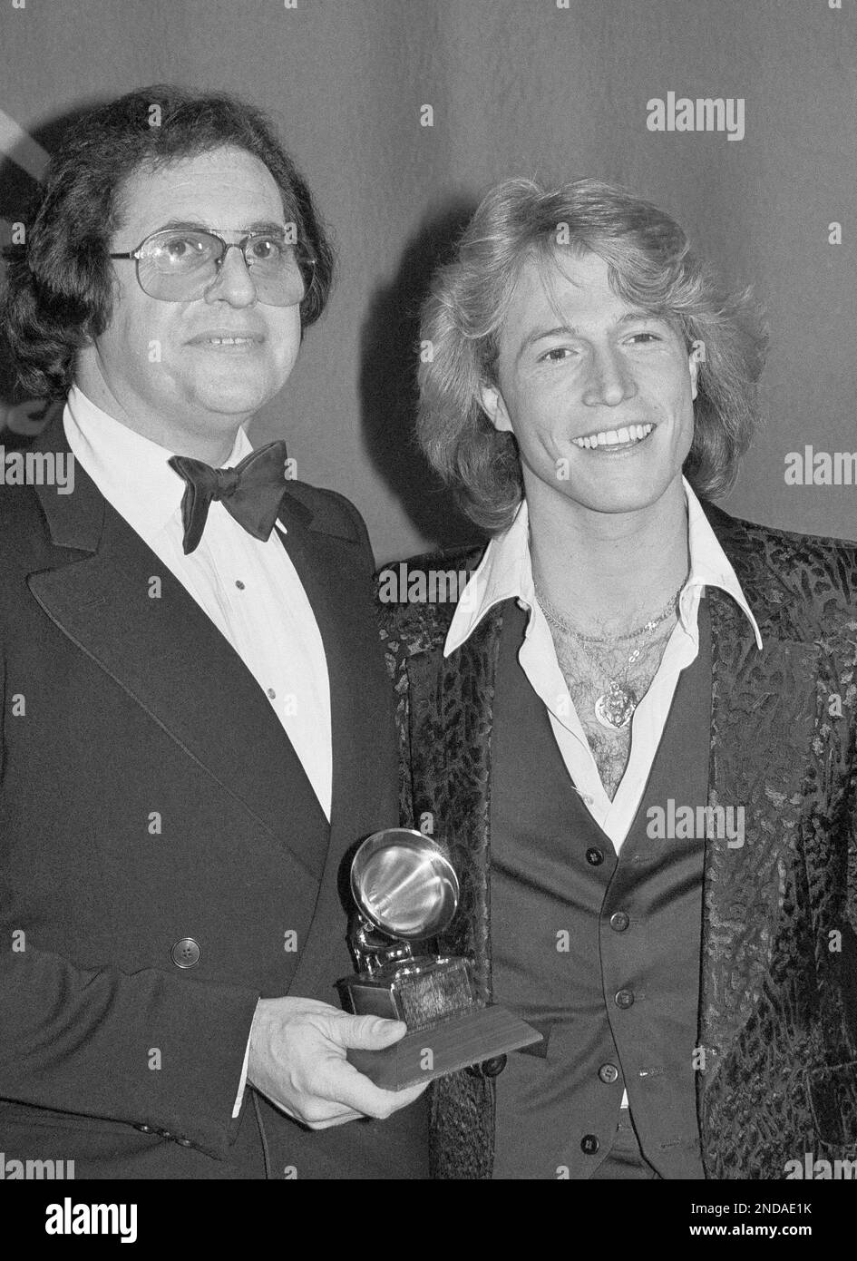 Record producer Phil Ramone and singer Andy Gibb smile at the Grammy ...