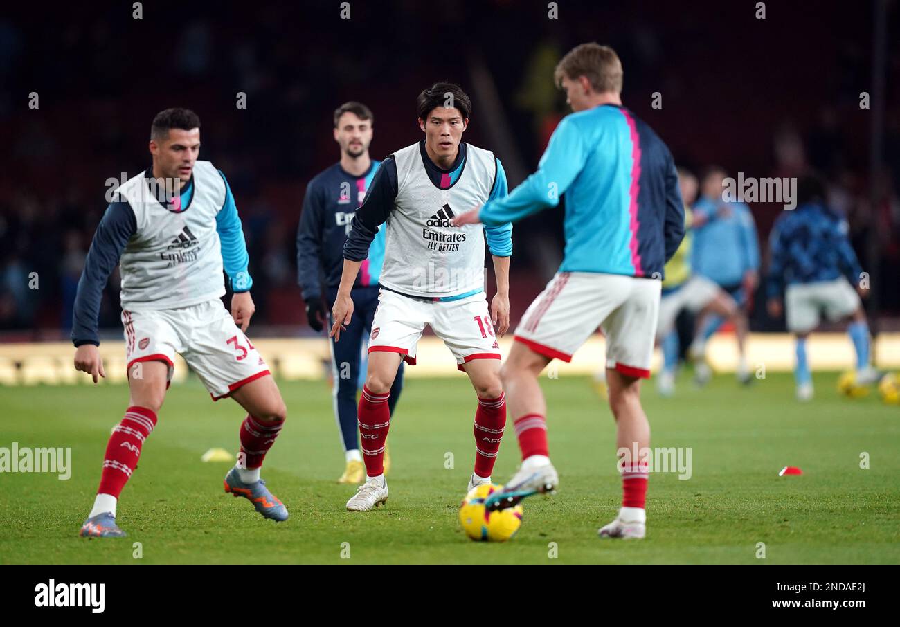 Arsenal’s Takehiro Tomiyasu warms up before the Premier League match at ...