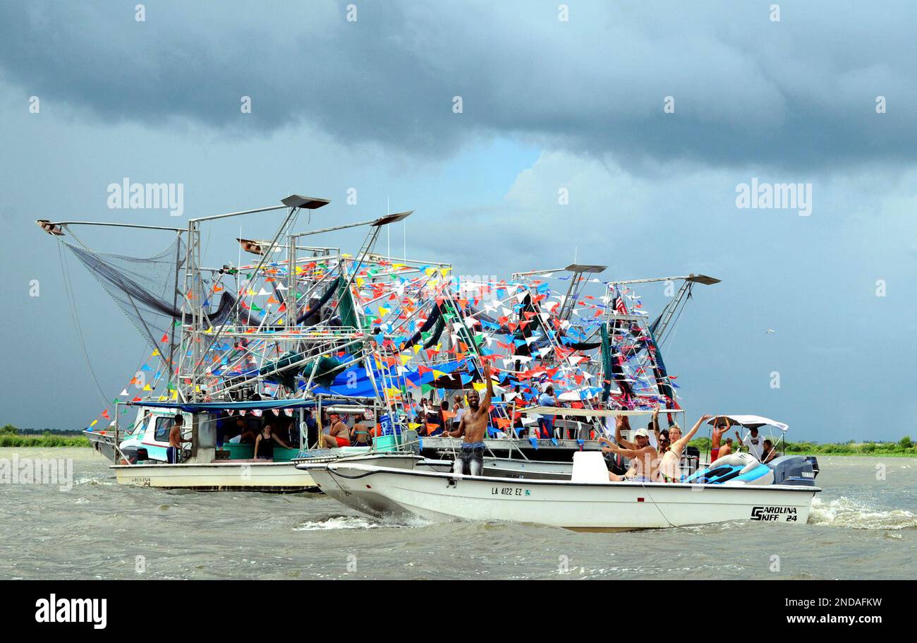Fishing boats gather in Lake Decade near Theriot, La., during the pre ...
