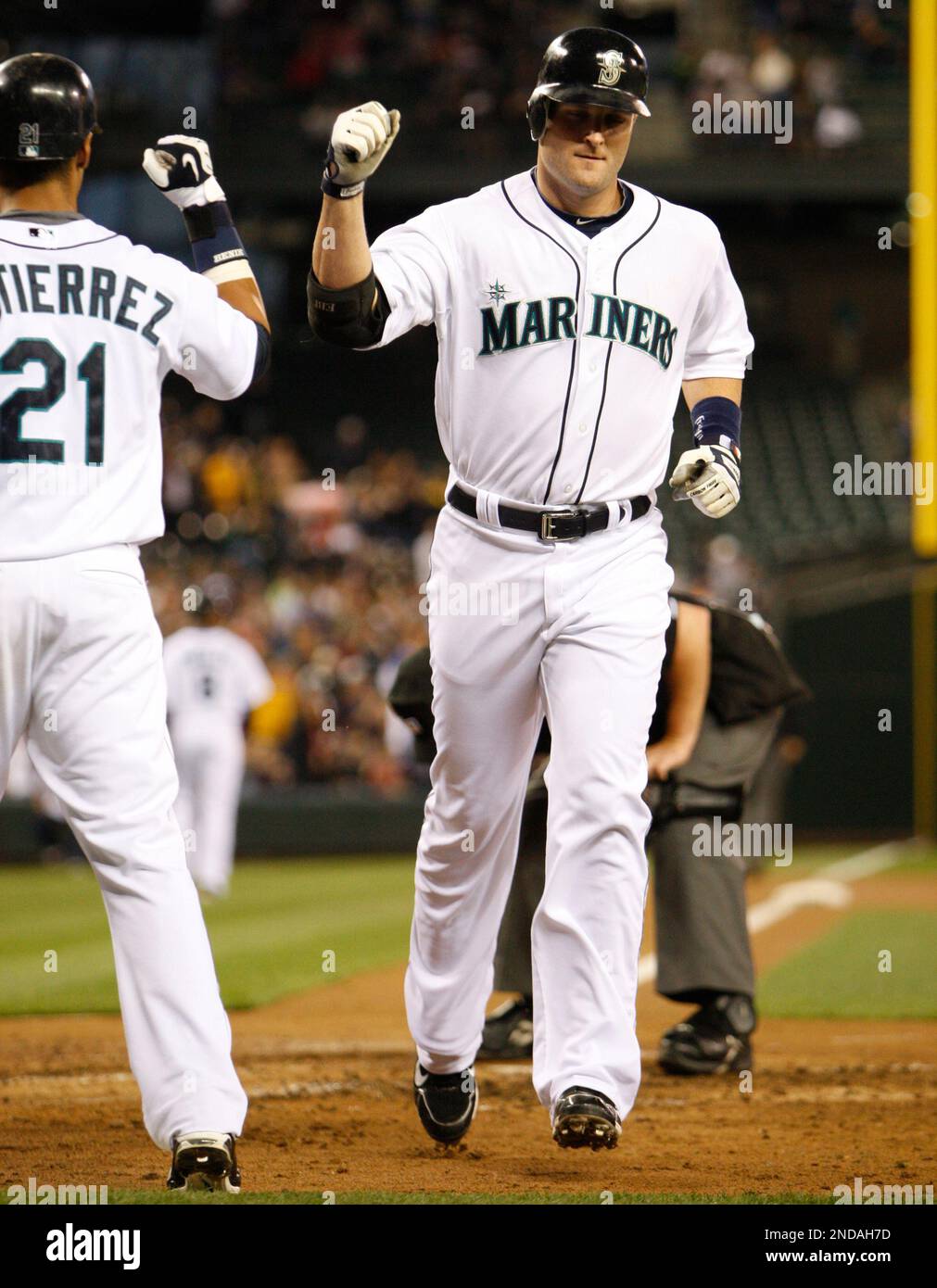 Seattle Mariners' Franklin Gutierrez, left, congratulates Russell ...
