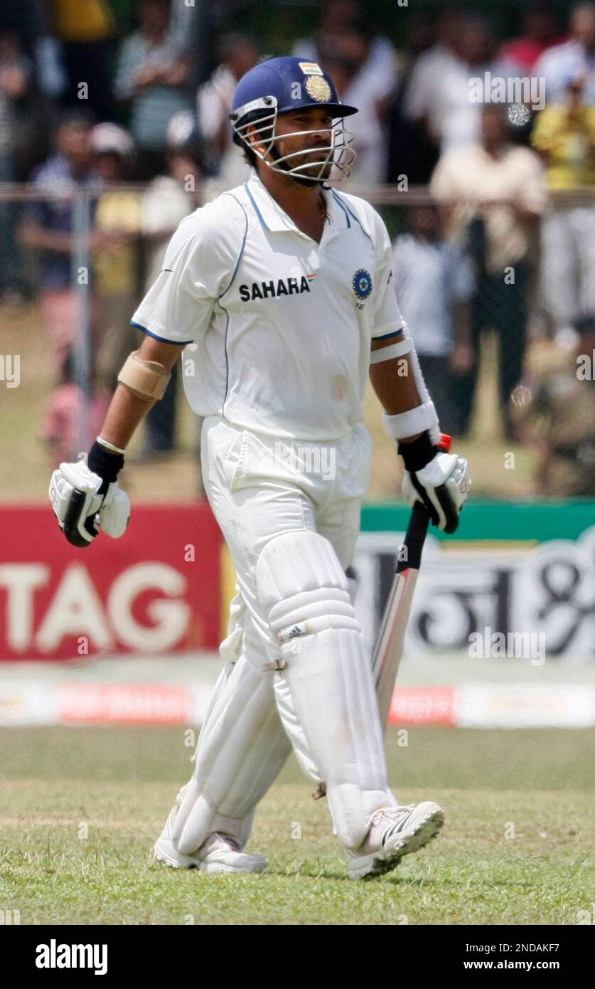 Indian cricketer Sachin Tendulkar walks back towards the pavilion after ...
