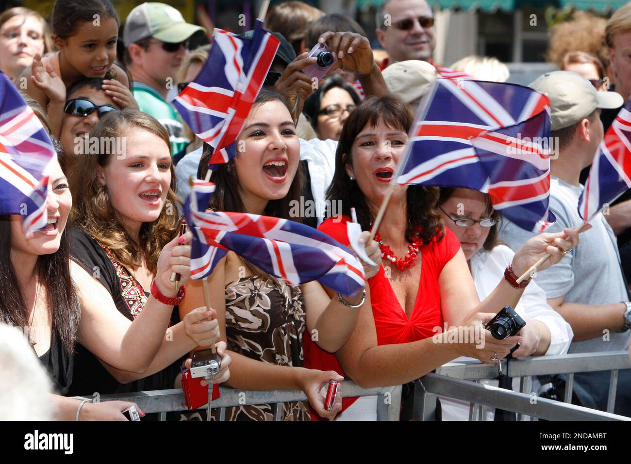 English fans cheer for British actress Emma Thompson, not seen, being ...