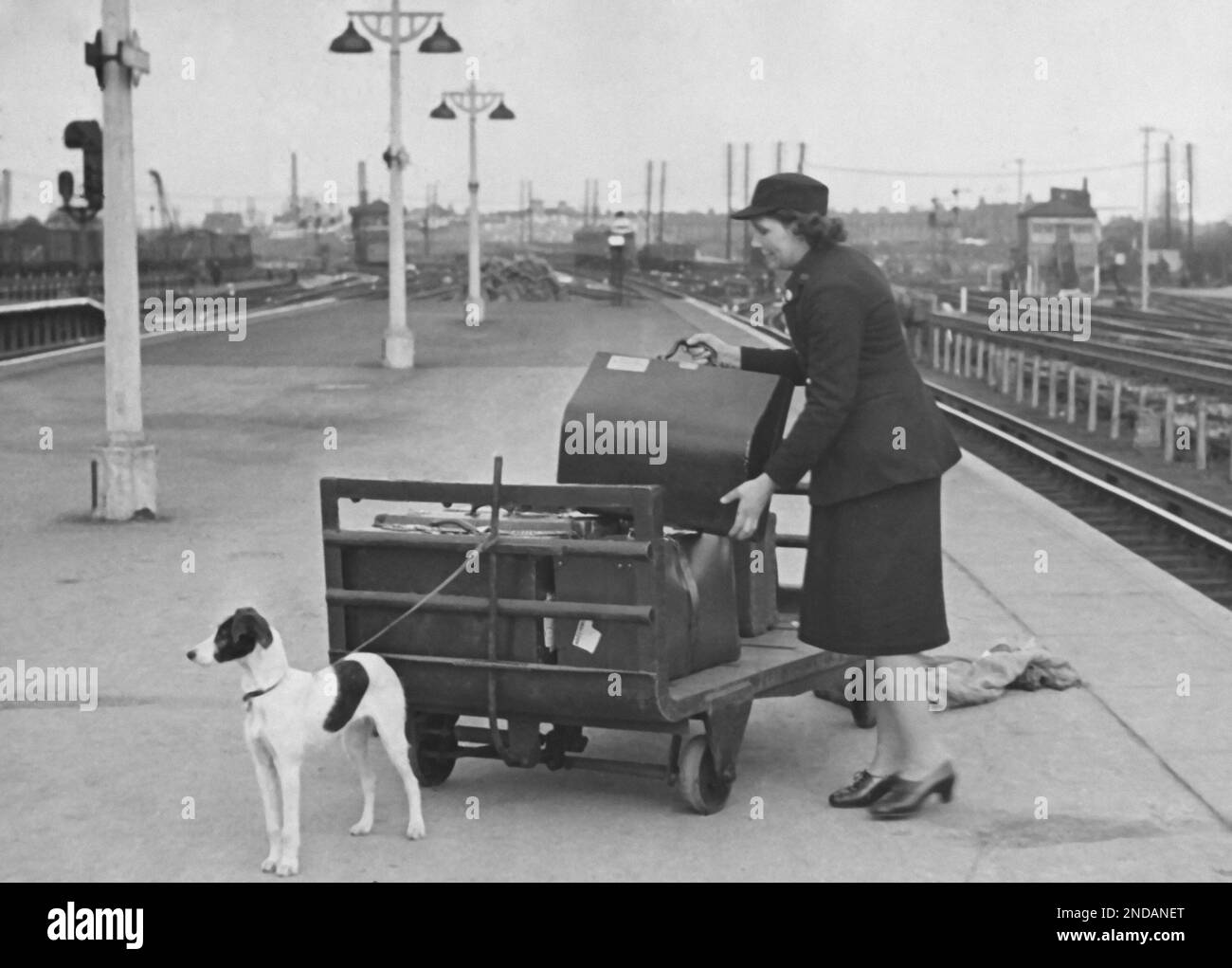 Woman porter in uniform at Wimbledon station Southern Railway, in 1941 ...