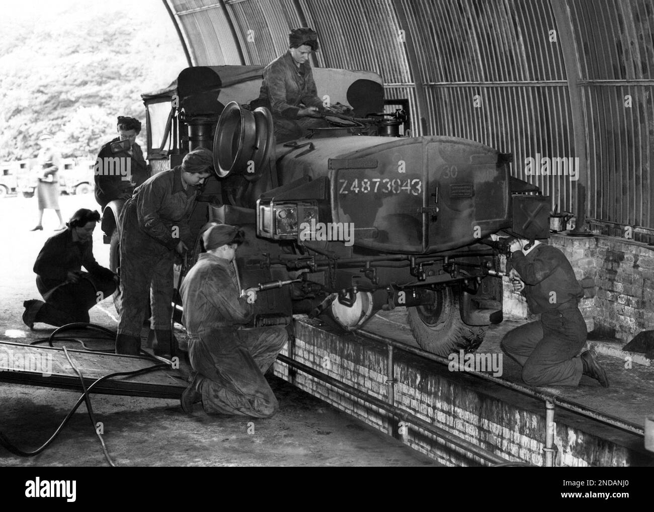 Greasing and repairing vehicles of every description damaged in combat ...