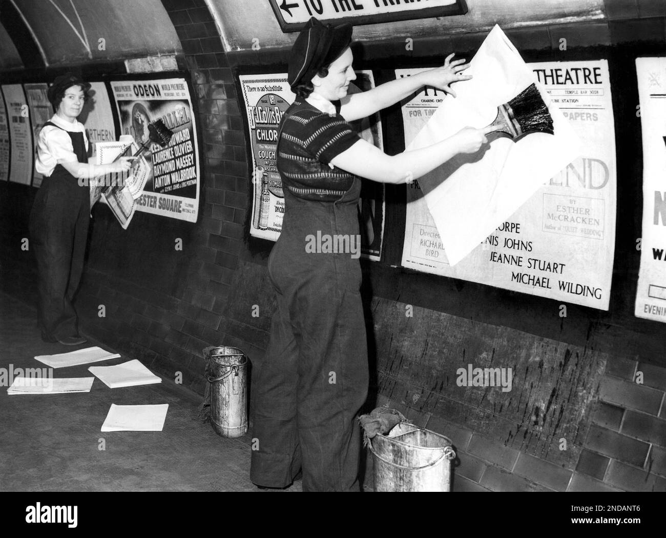 The London transport is now training women for bill posting. It is not ...