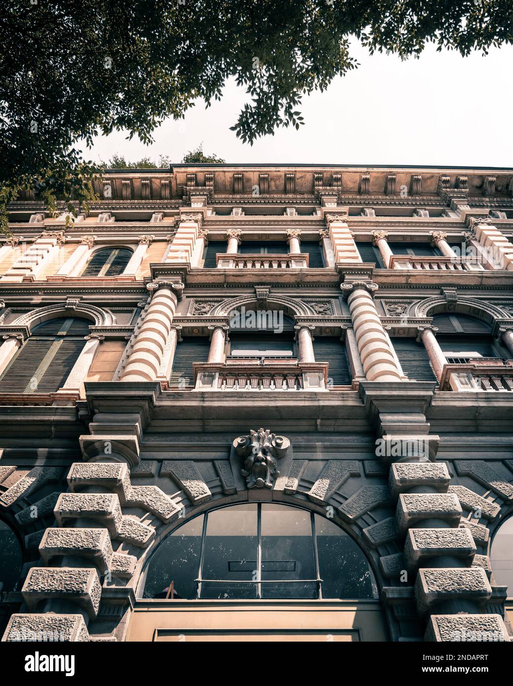 A vertical low angle shot of the exterior of an old European building ...