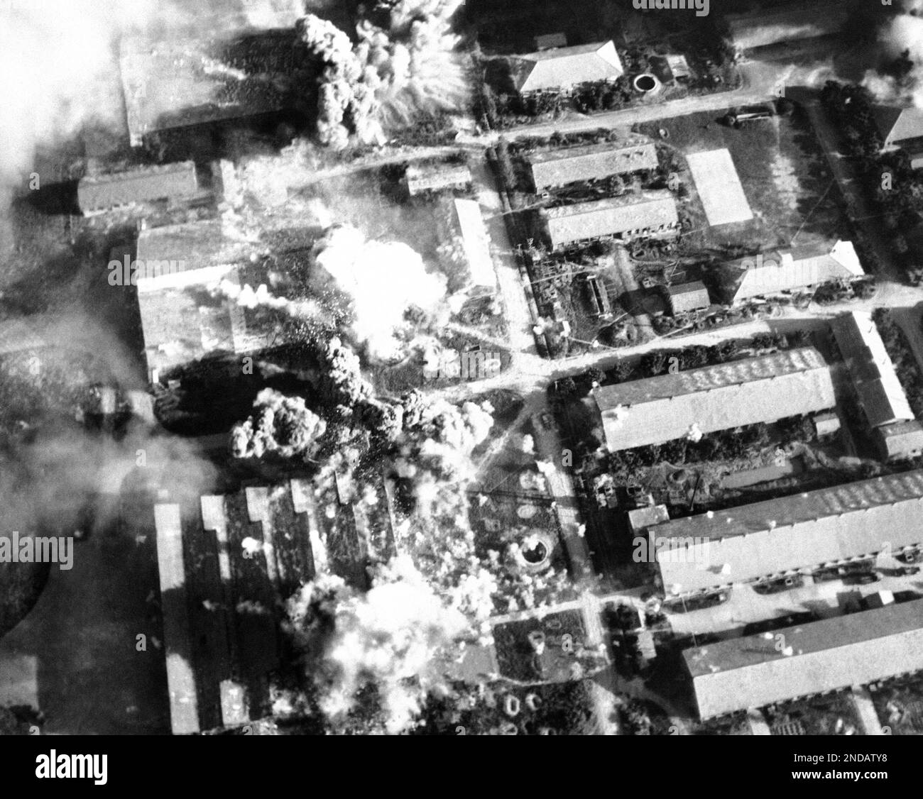 Bombs from U.S. carrier-based planes pound the warehouses and ...
