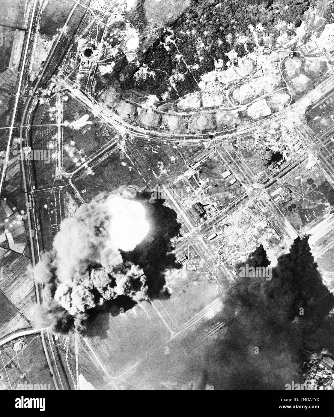 Blast of flame flowers from the Toshien Oil Refinery in Formosa as 1000 ...