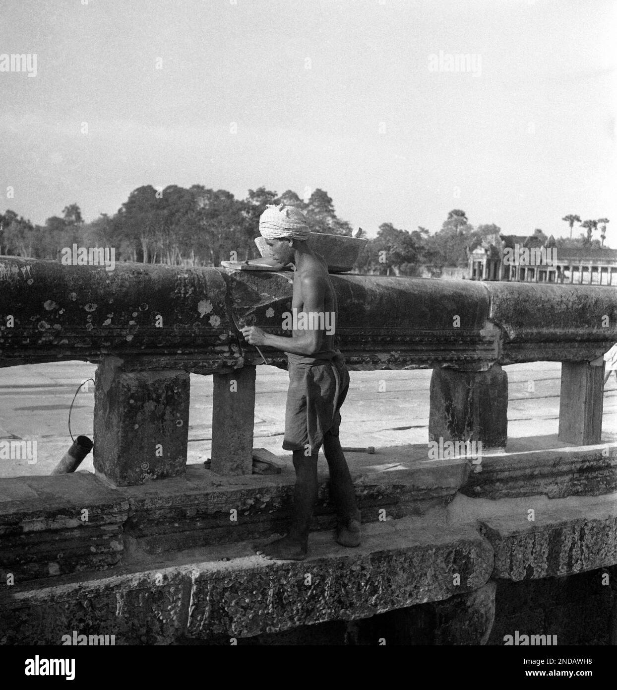 This stone-mason, whose right foot is in an advanced stage of leprosy ...