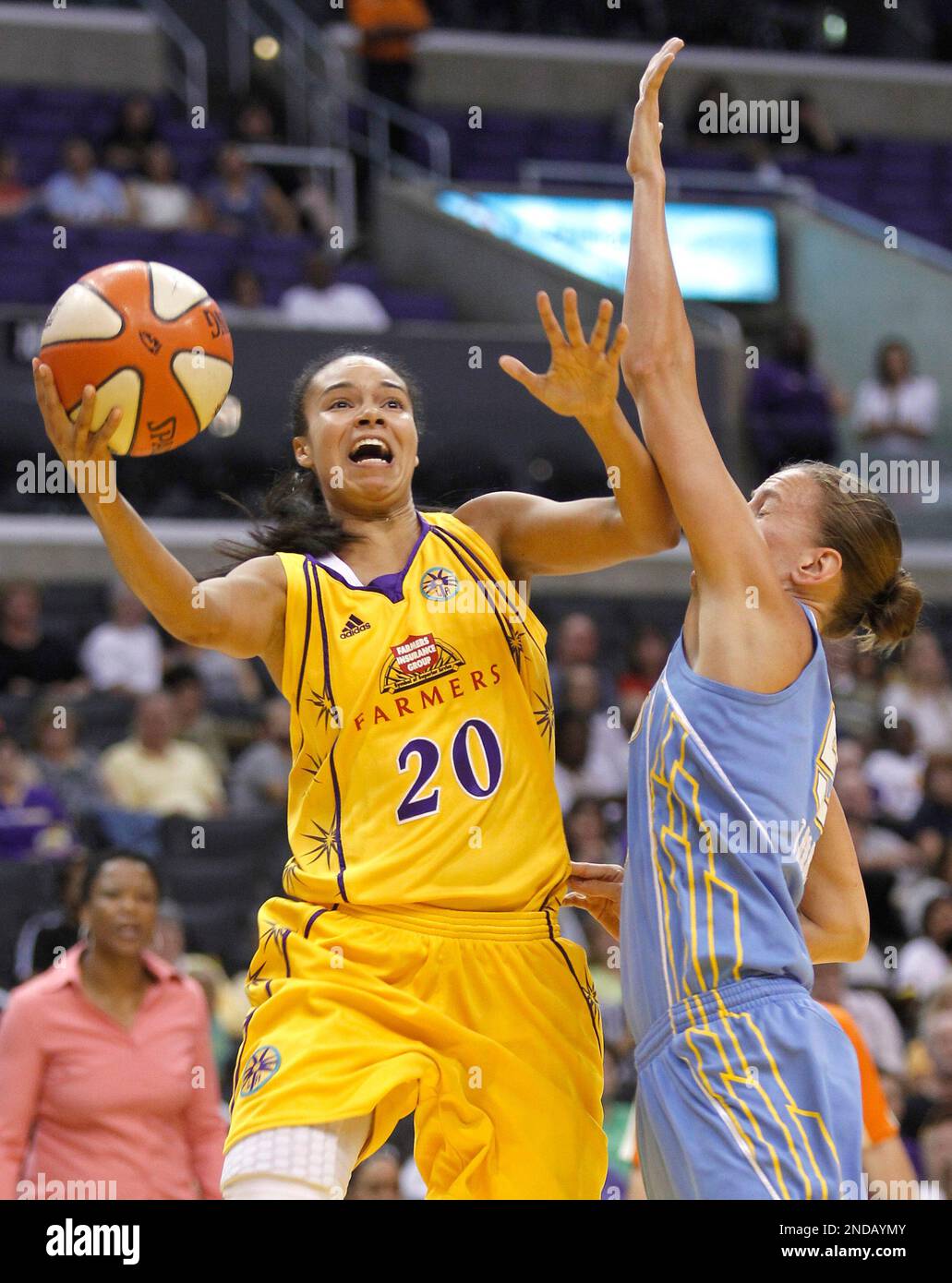 Los Angeles Sparks' Kristi Toliver (20) goes up for a basket over ...