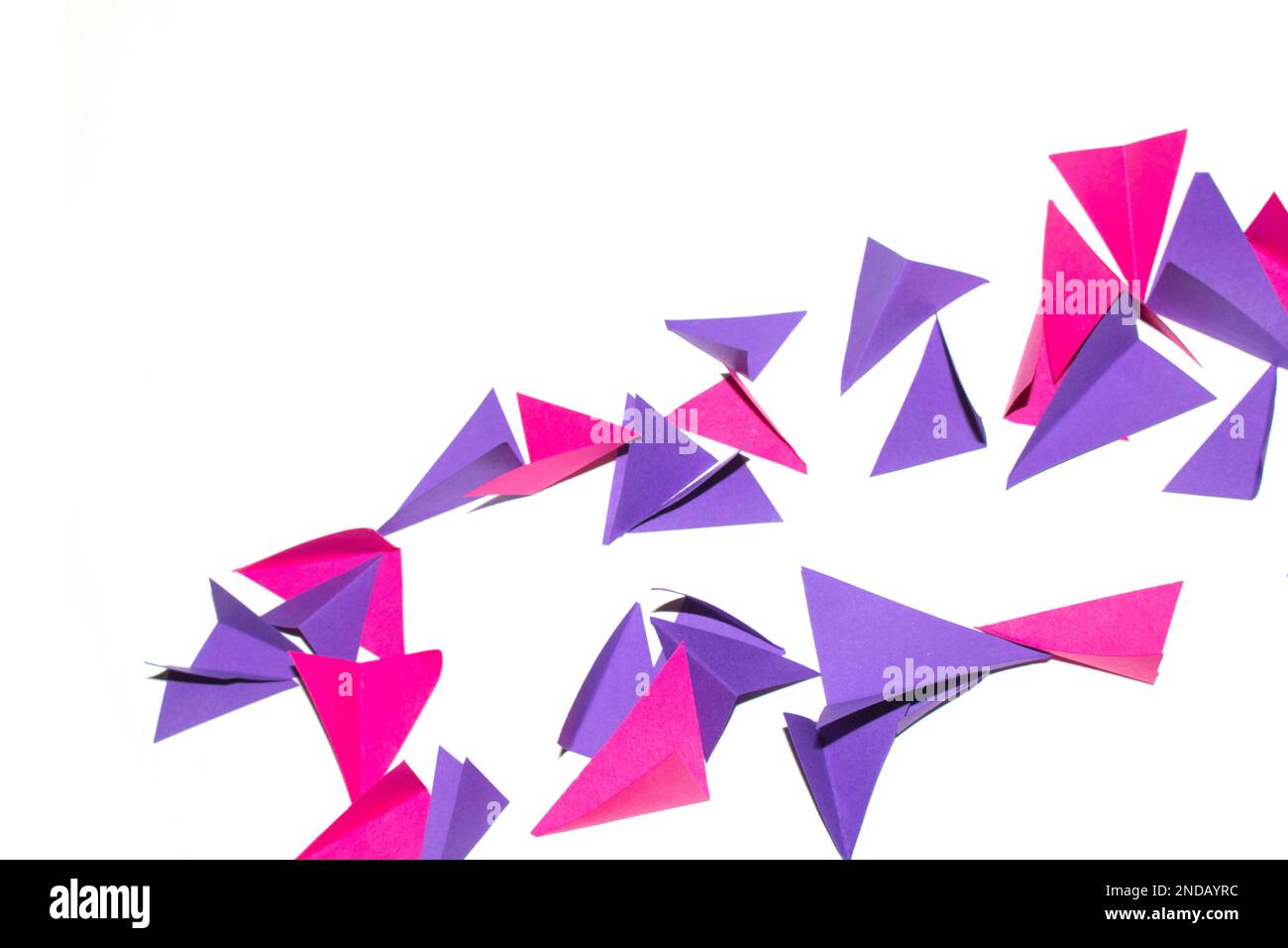 A Pink Purple and White Geometric Folded Paper Triangle Shapes for ...