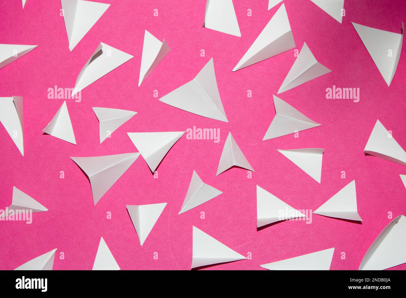 A Pink and White Geometric Folded Paper Triangle Shapes for Background ...
