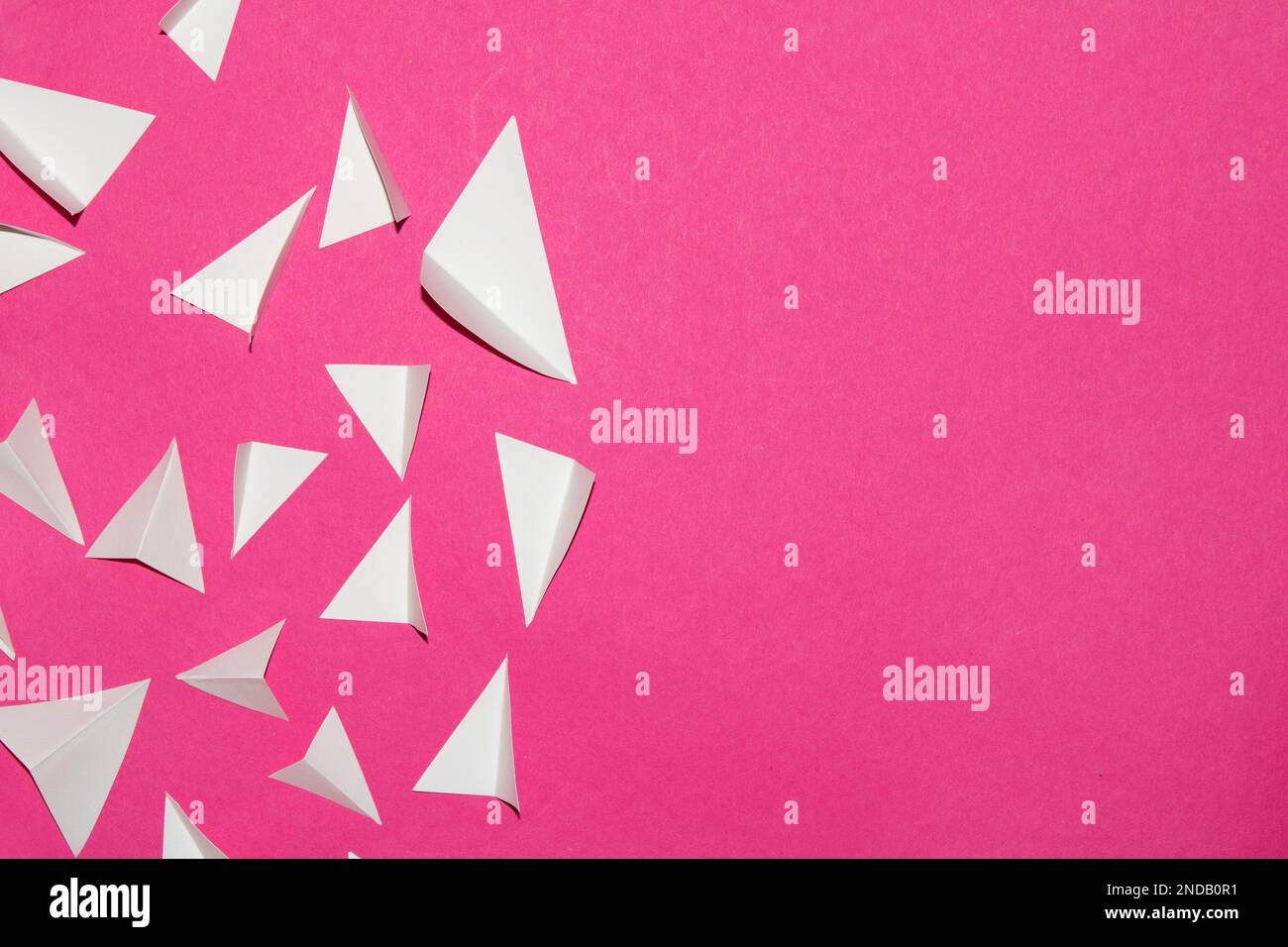 A Pink and White Geometric Folded Paper Triangle Shapes for Background ...