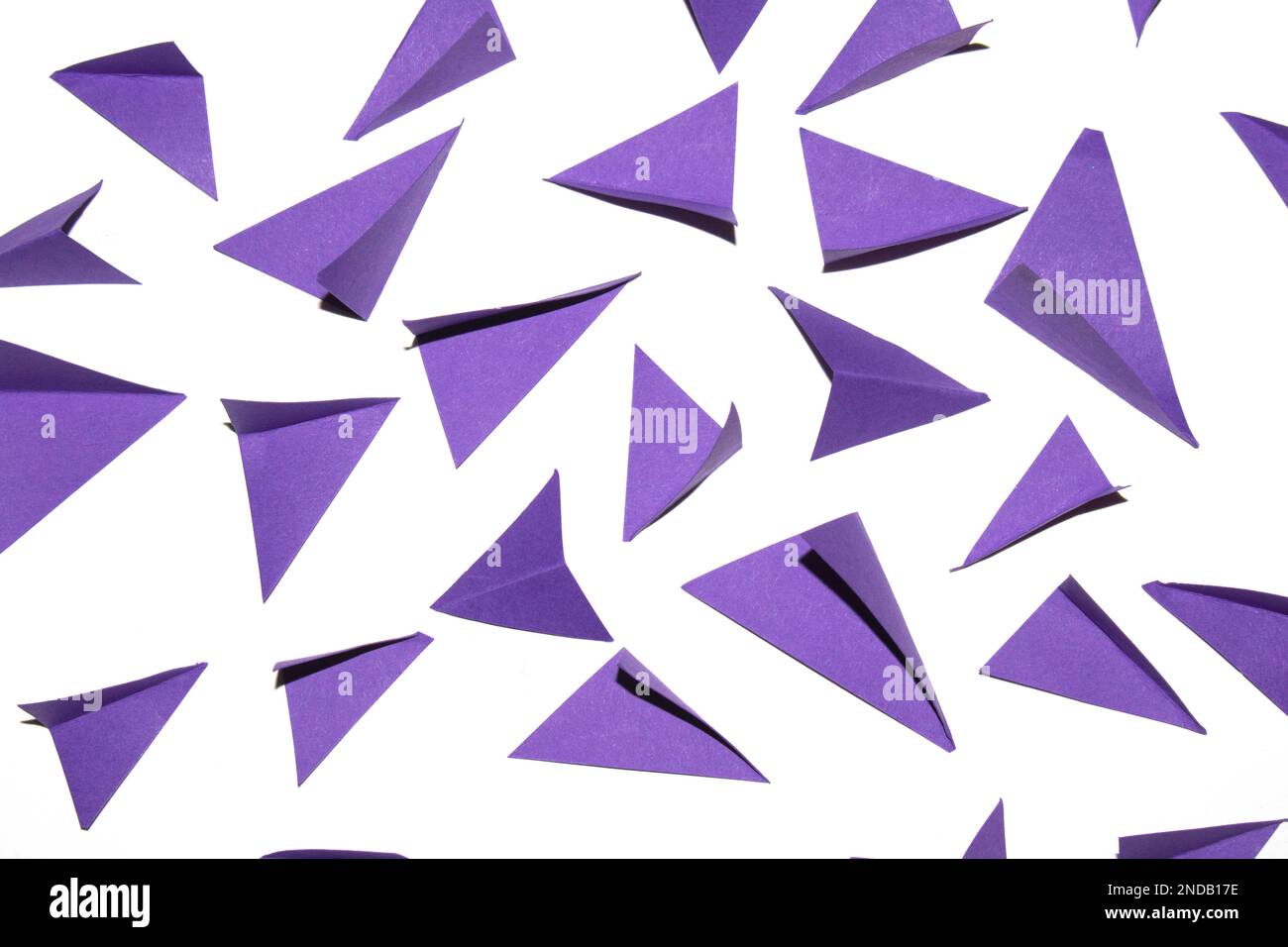 A Pink Purple and White Geometric Folded Paper Triangle Shapes for ...