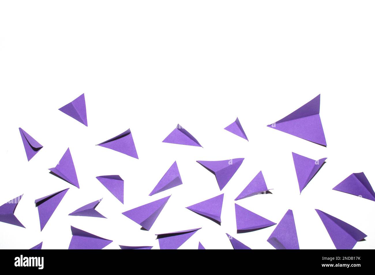 A Pink Purple and White Geometric Folded Paper Triangle Shapes for ...