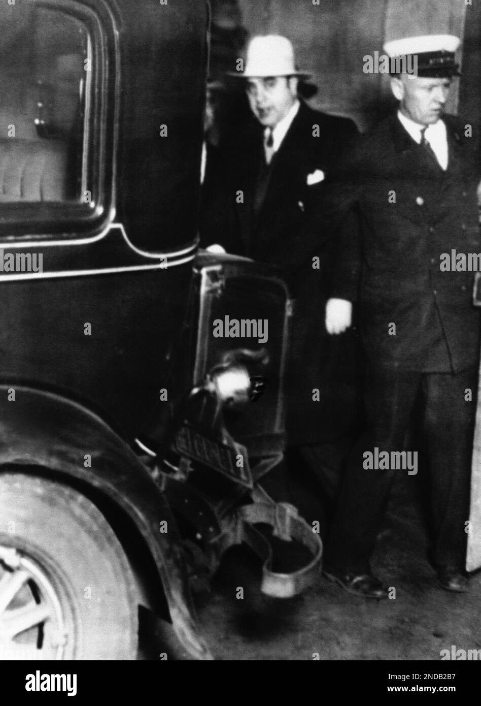 Al Capone is placed in a car at Cook County Jail in Chicago, May 3 ...