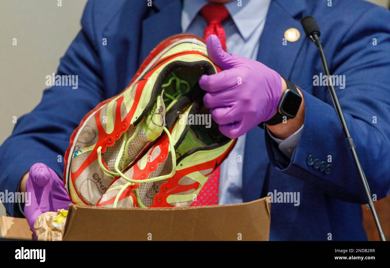 SLED agent David Owen opens evidence containing shoes belonging to Alex ...