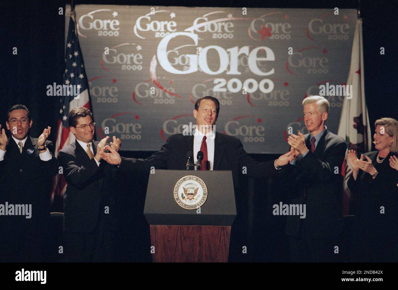 Vice President Al Gore opens his arms to thank supporters who ...