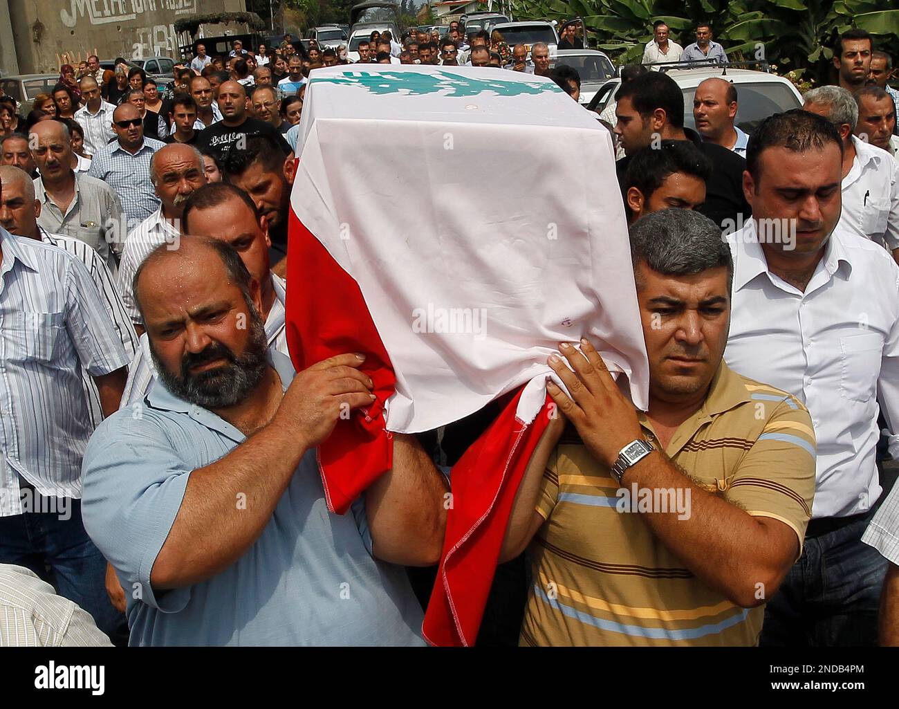 Relatives of Sgt. Robert Ashi, who killed on Tuesday during a clash ...