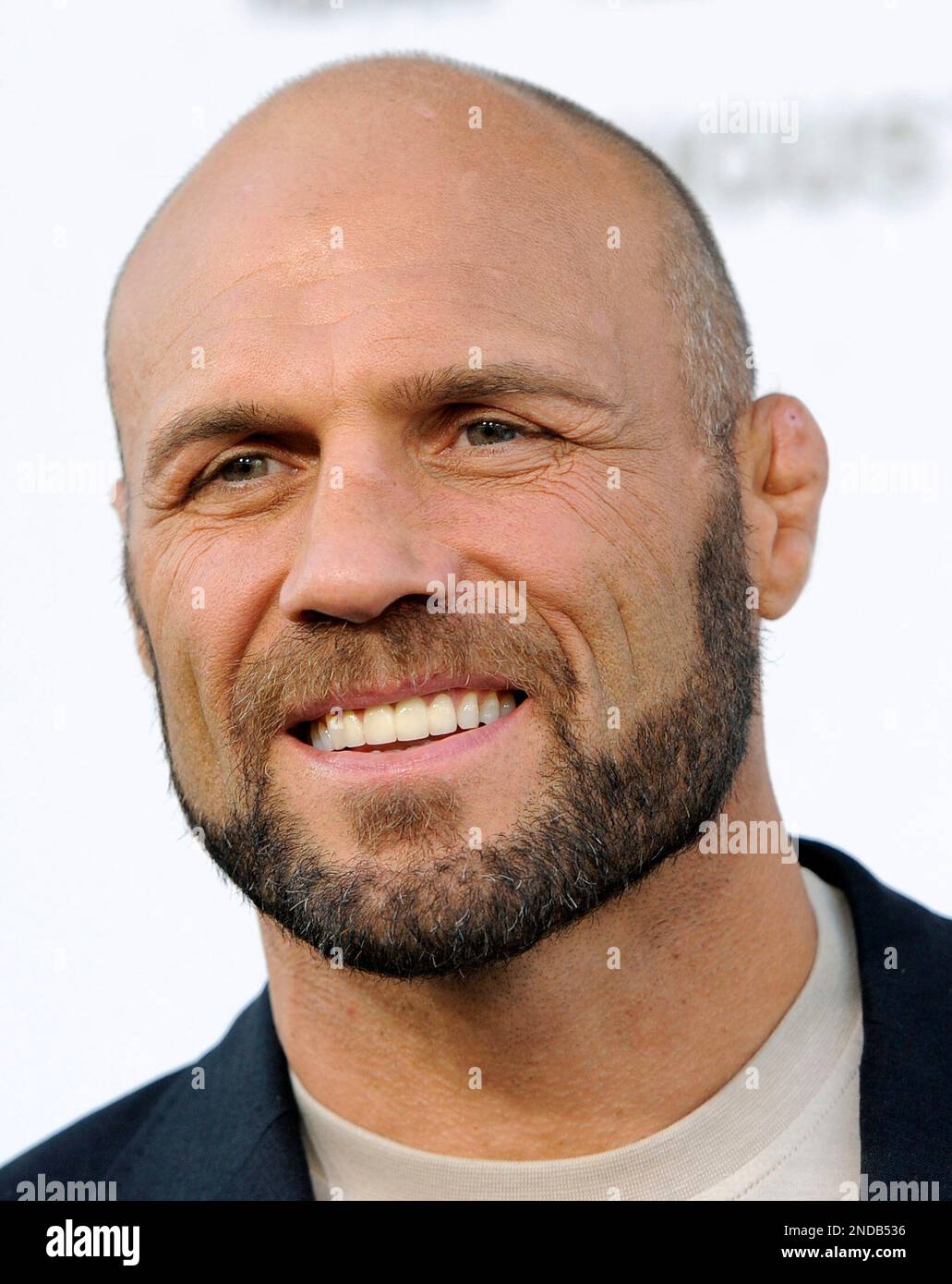 Randy Couture, a cast member in "The Expendables," poses at the ...