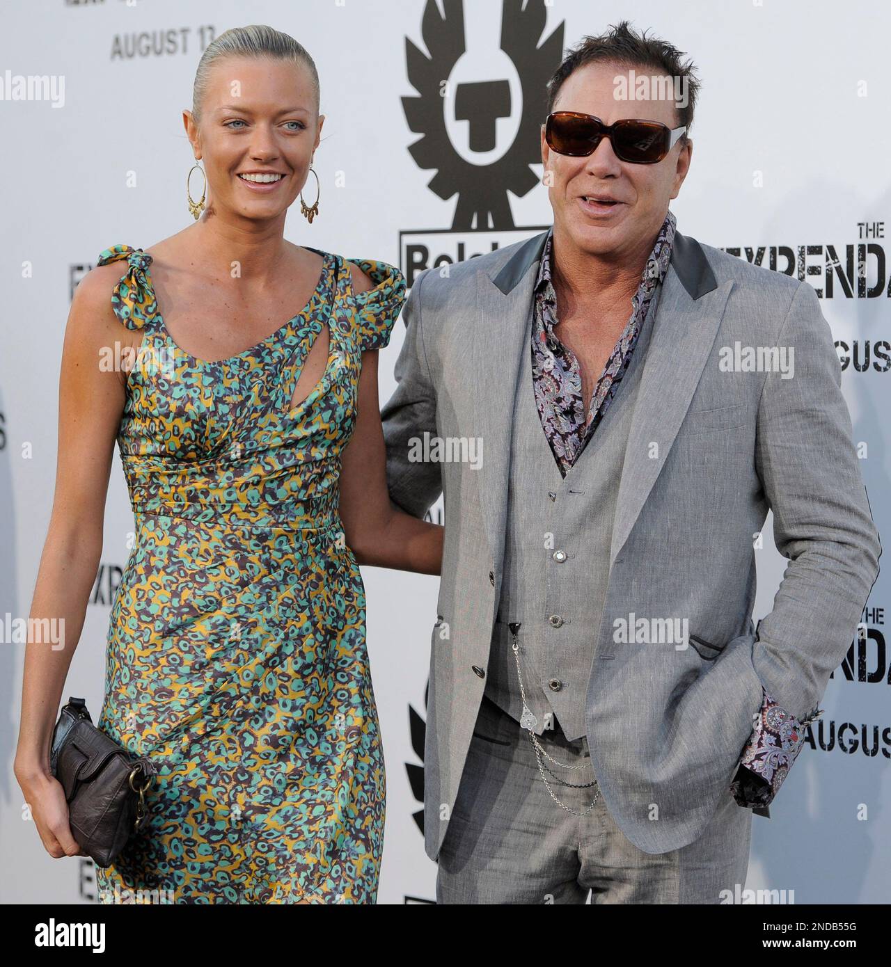 Mickey Rourke, a cast member in "The Expendables," arrives with his ...