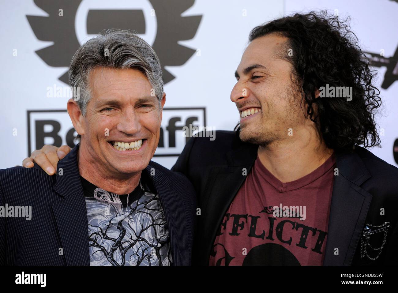 Eric Roberts, left, a cast member in "The Expendables," and his step ...