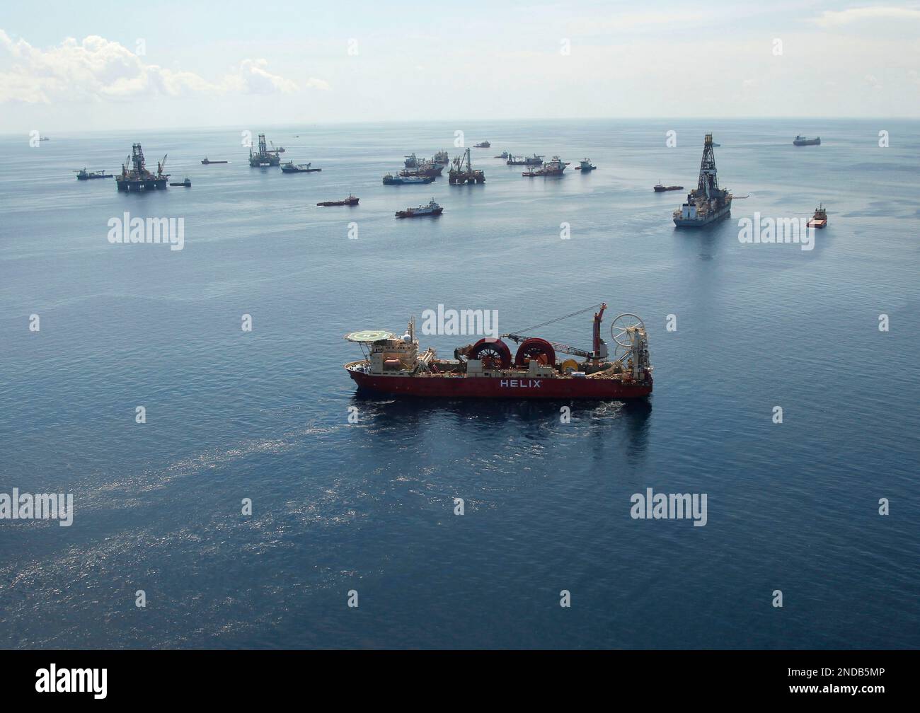 A support vessel, front center, is seen among others surrounding the ...