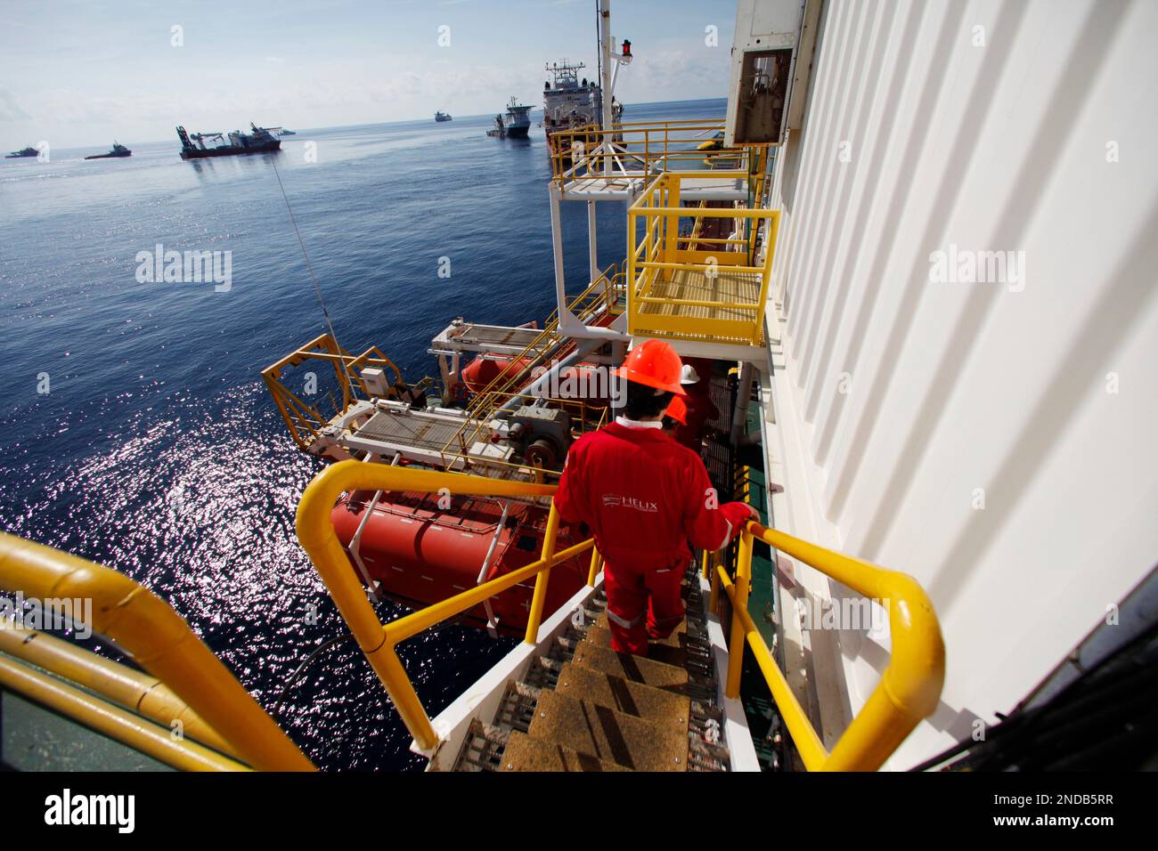 Support vessels are seen from the Helix Q4000, which is pumping the mud ...